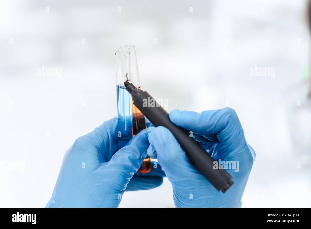 Scientist in lab coat tubes hi-res stock photography and images - Alamy