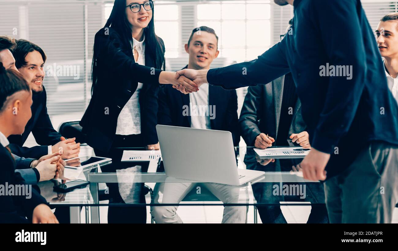business colleagues greeting each other at an office meeting Stock ...