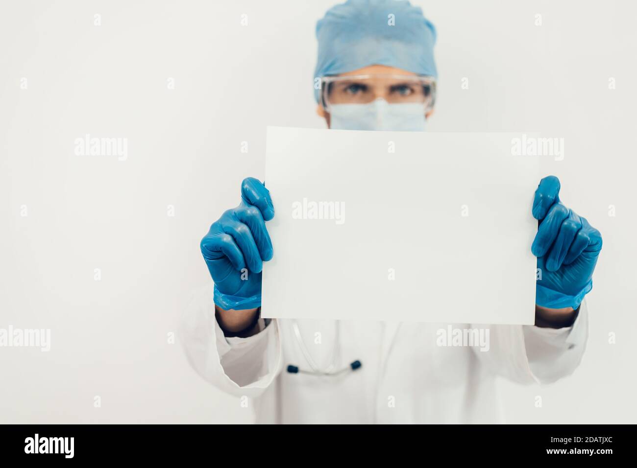 close up. blank white sheet in the hands of a doctor Stock Photo - Alamy
