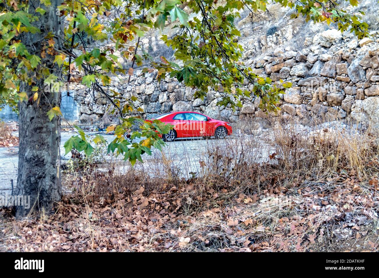 Bright red car hi-res stock photography and images - Alamy