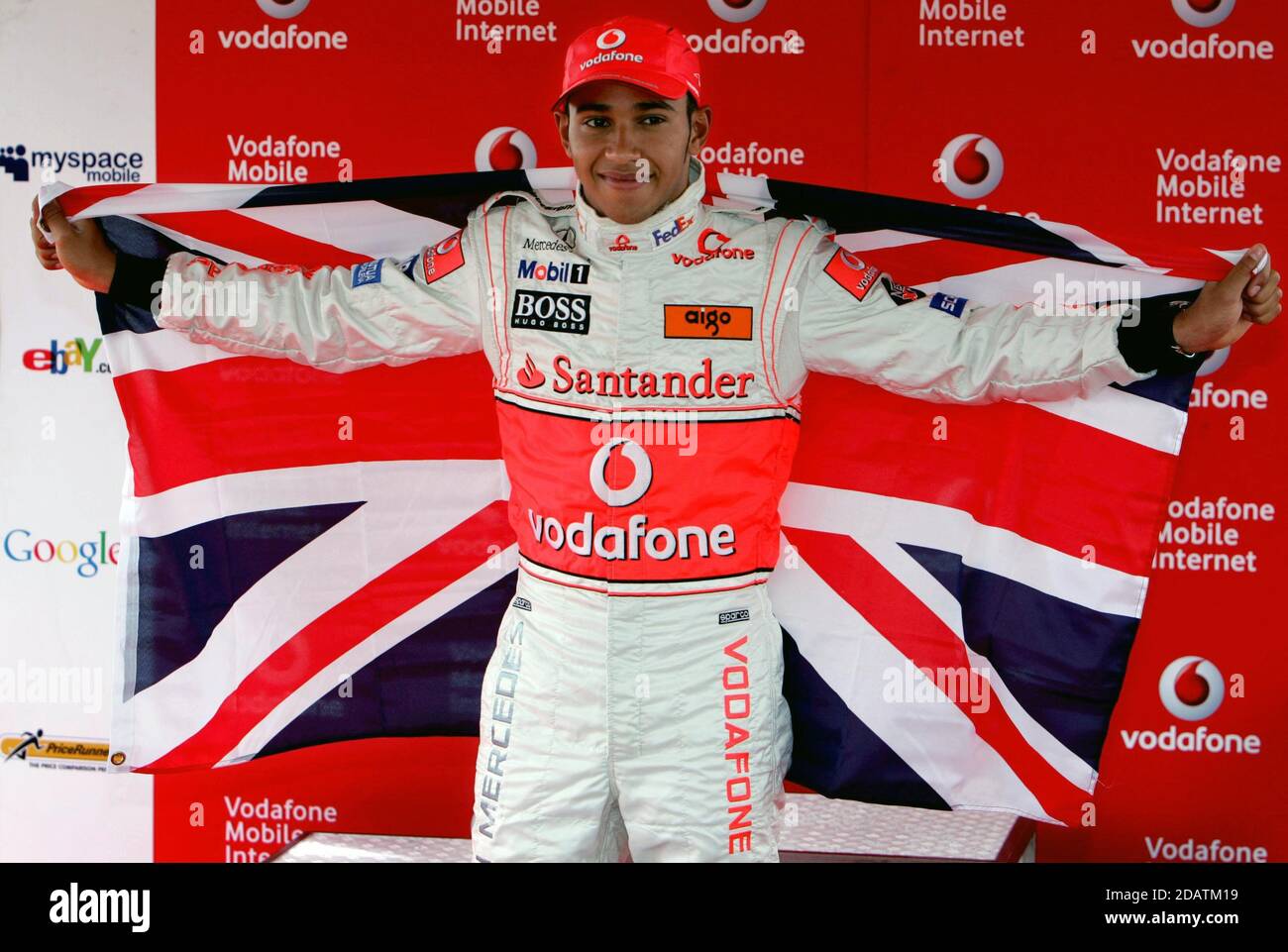 Formula one driver lewis hamilton holds union jack flag daytona hi-res ...