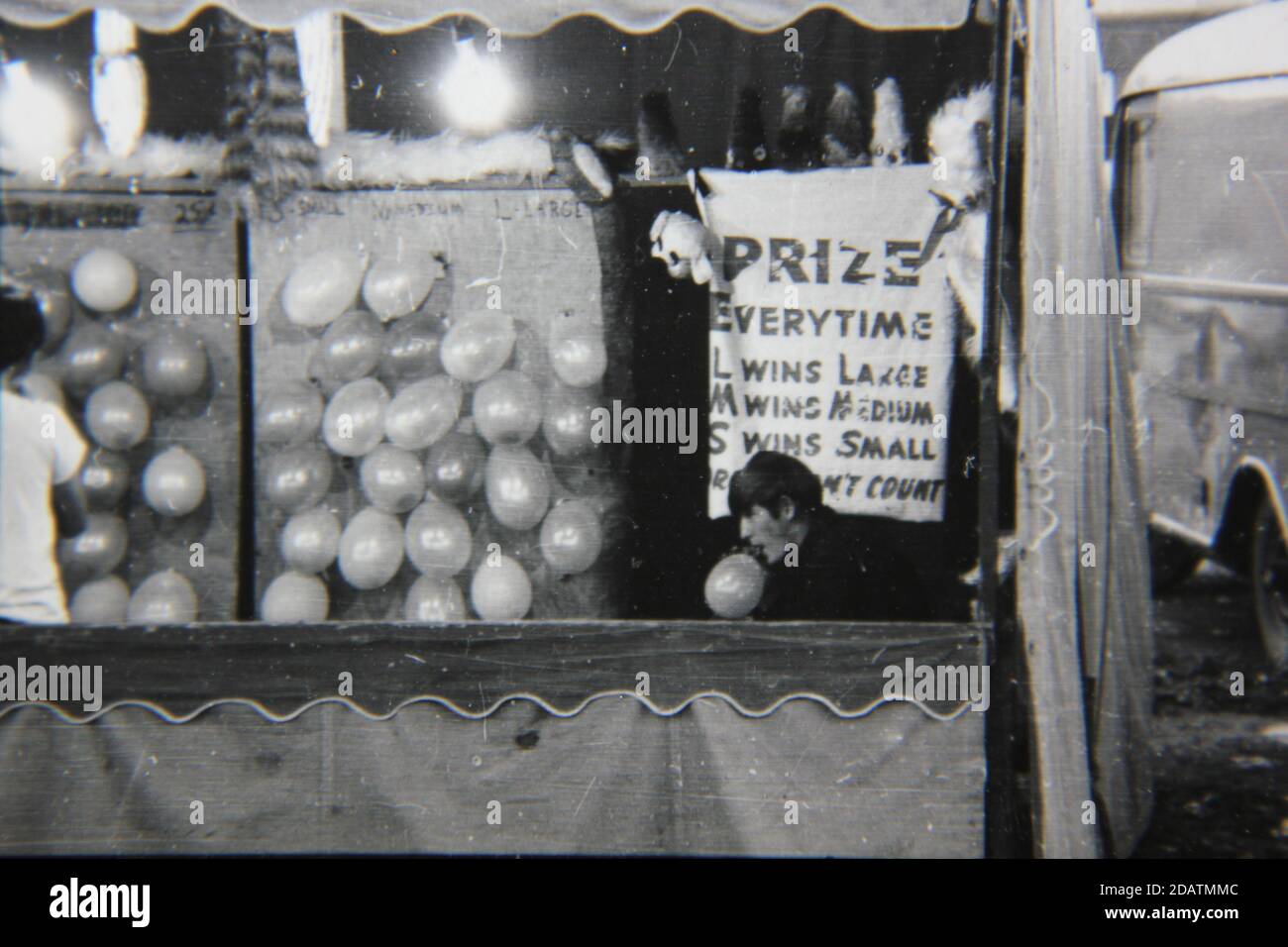 Fine 1970s vintage black and white photography of a game booth at a ...