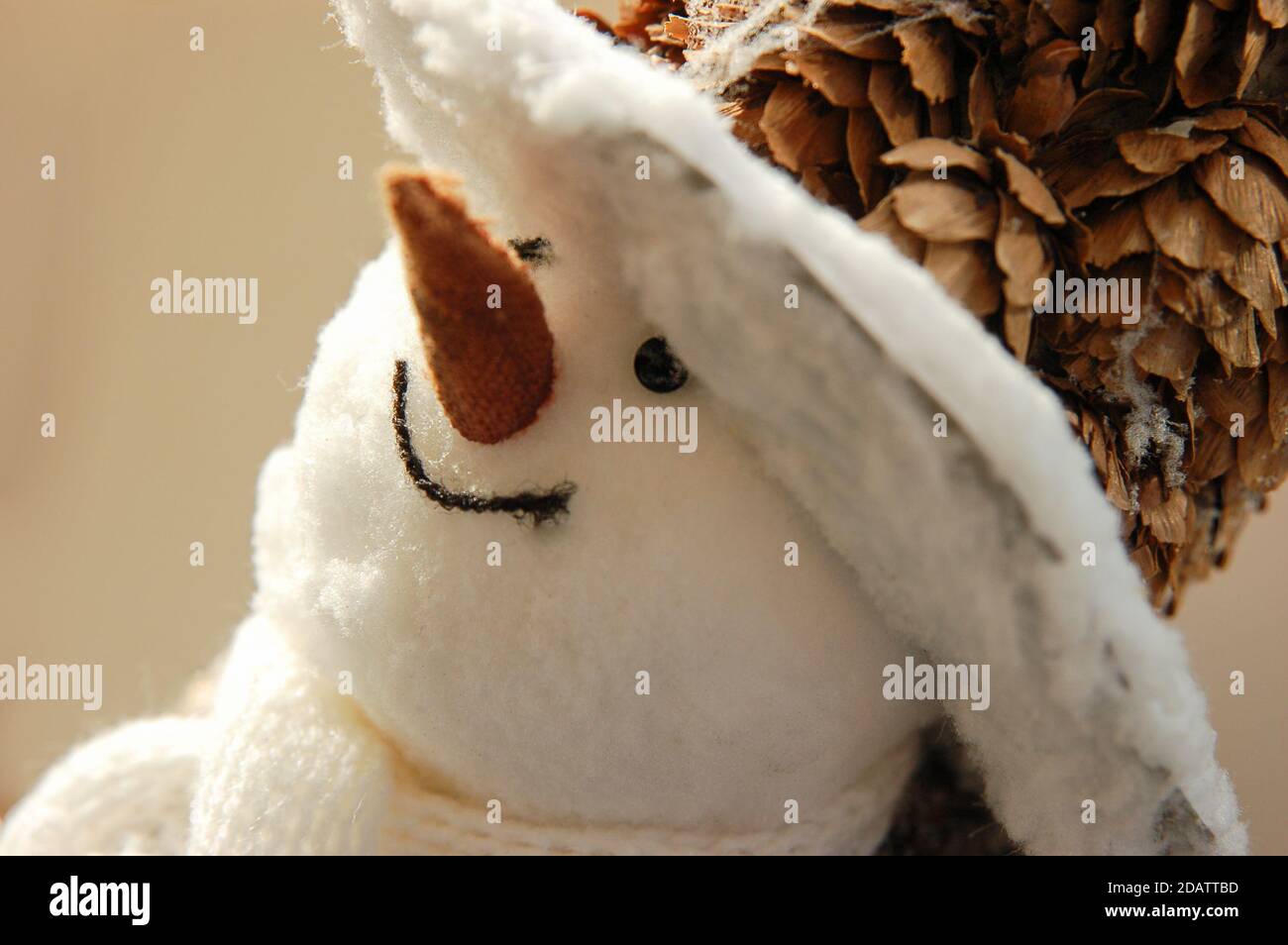 Very close up profile portrait of a snowman toy looking up Stock Photo ...