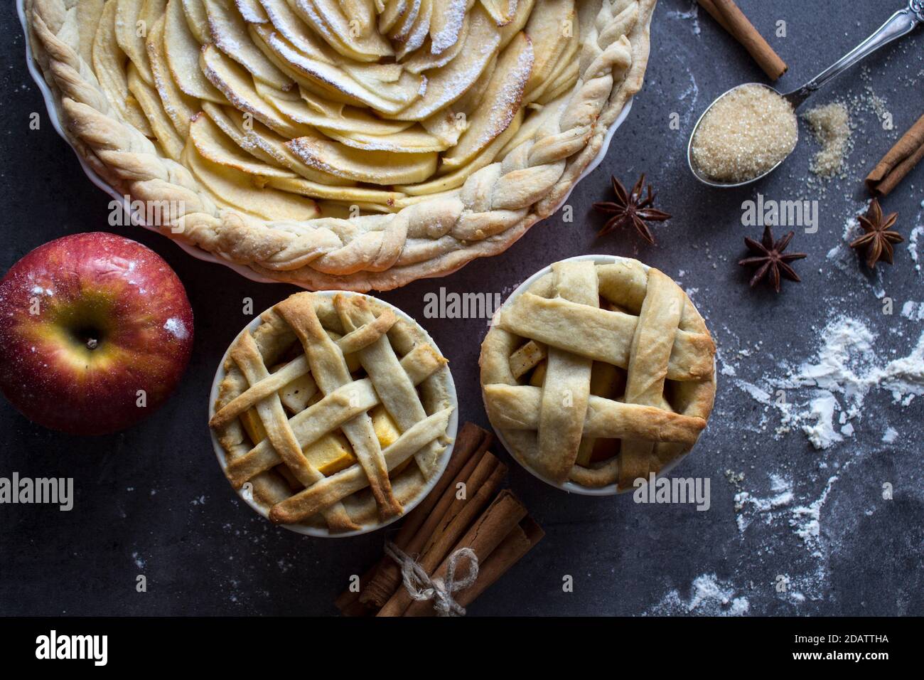 Apple pie. Beautiful decorated pastry items on a table. Delicious cakes ...