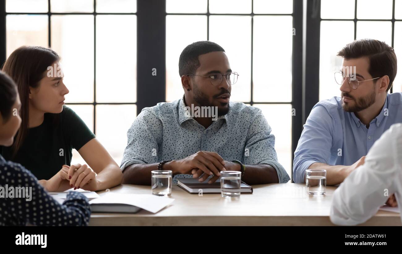 Confident african ceo speaking to diverse staff on formal meeting Stock ...