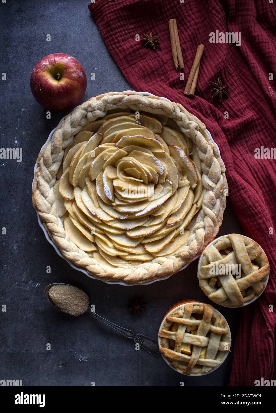 Apple pie. Beautiful decorated pastry items on a table. Delicious cakes ...