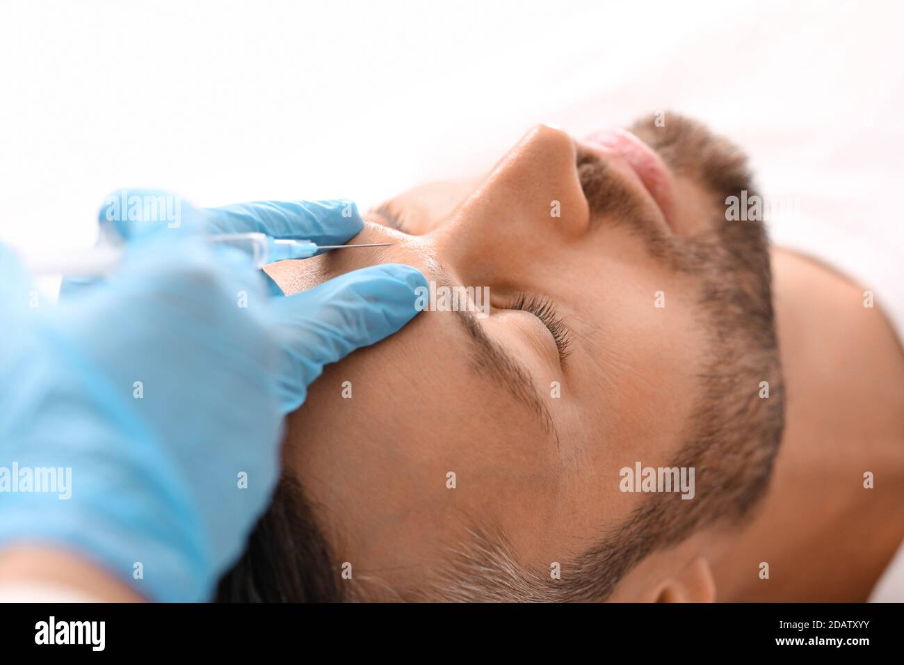 Man getting procedure injection hi-res stock photography and images - Alamy