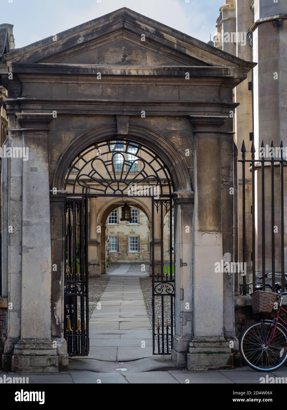 CAMBRIDGE, UK - MARCH 11, 2020: Old stone entrance arch and gate to ...