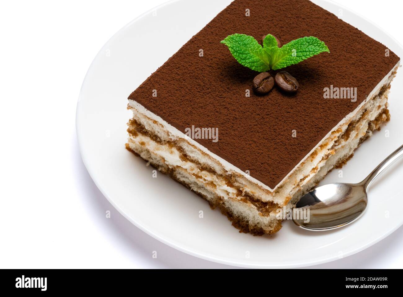 Traditional Italian Tiramisu square dessert portion on ceramic plate ...