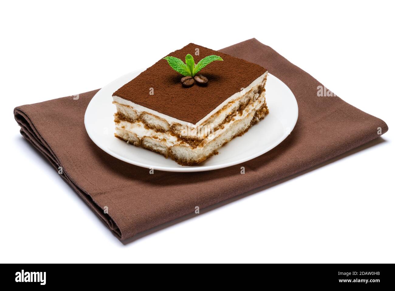 Traditional Italian Tiramisu square dessert portion on ceramic plate ...