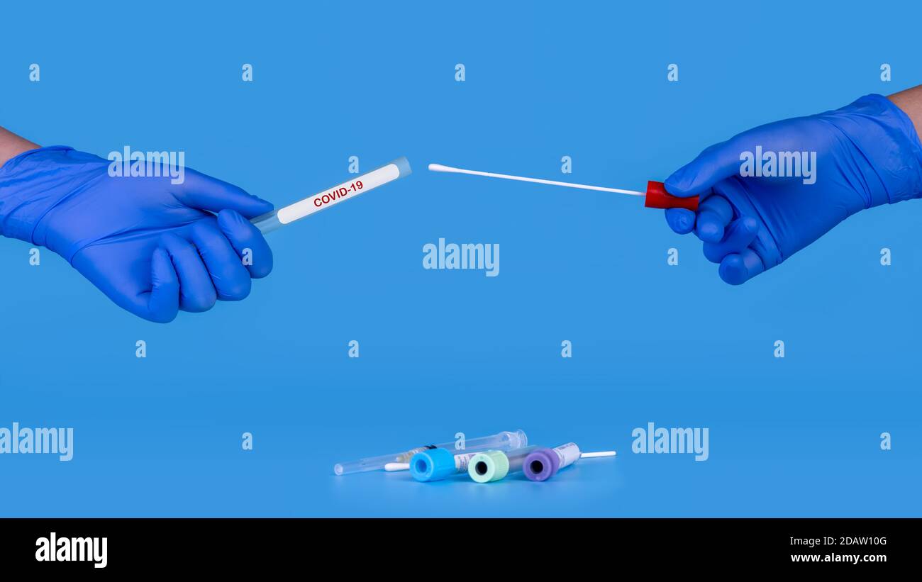COVID-19 Nasal Swab PCR Laboratory Express Test Agains Blue Backgroud ...