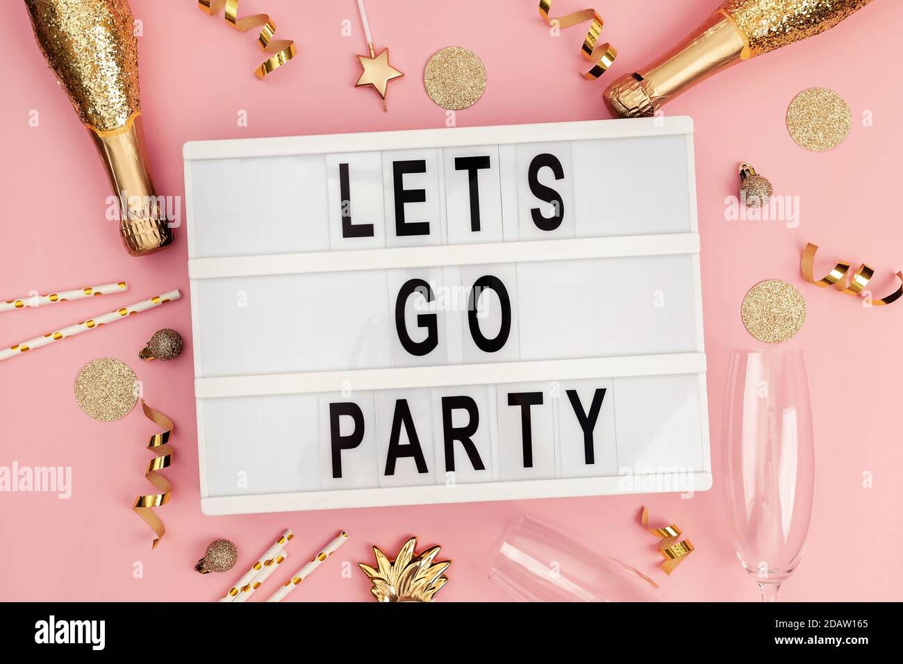 Stylish festive party decor in golden color Stock Photo - Alamy
