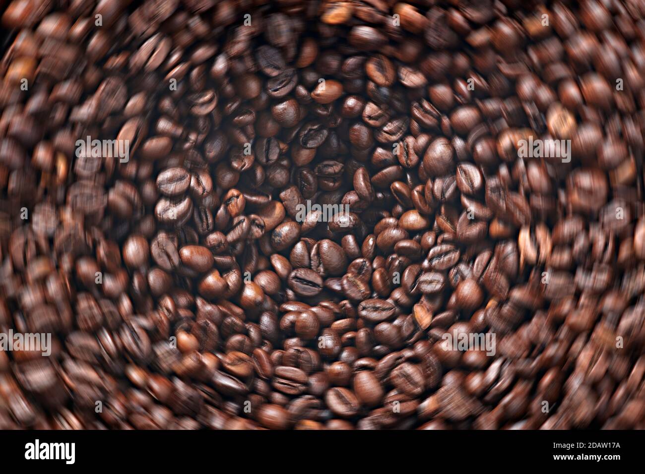 Coffee beans rotate during roasting Stock Photo - Alamy