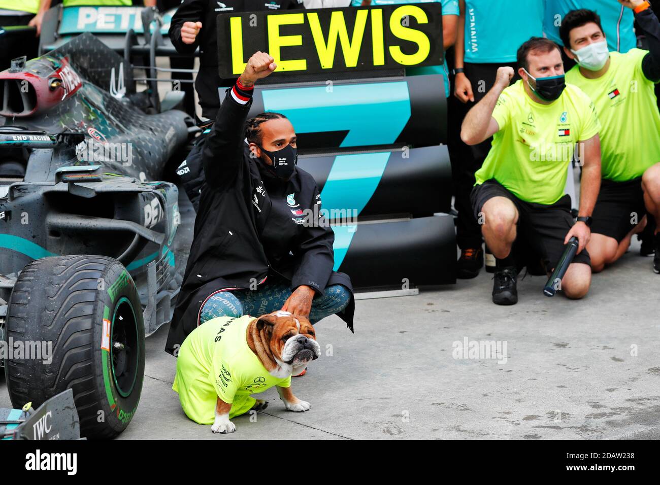 Mercedes AMG F1's Lewis Hamilton celebrates with his dog Roscoe after ...