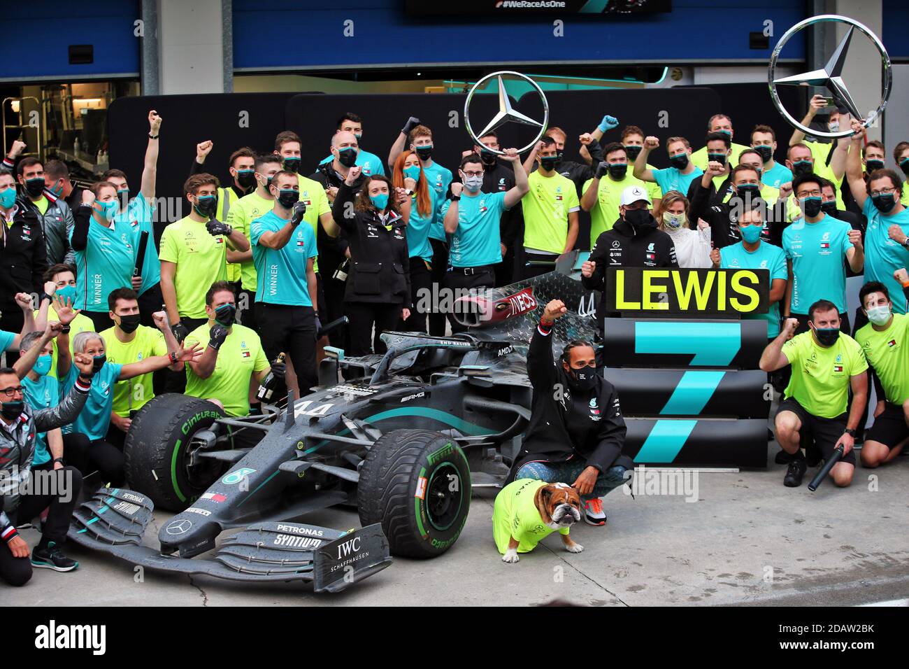 Mercedes AMG F1's Lewis Hamilton celebrates with his dog Roscoe and his ...