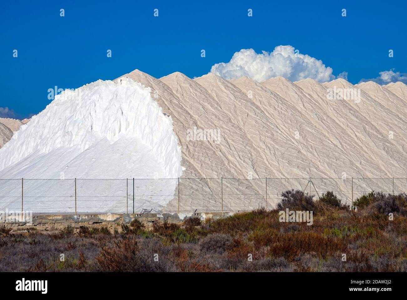 Huge piles of salt produced by salinas, saltpans, at Santa Pola ...