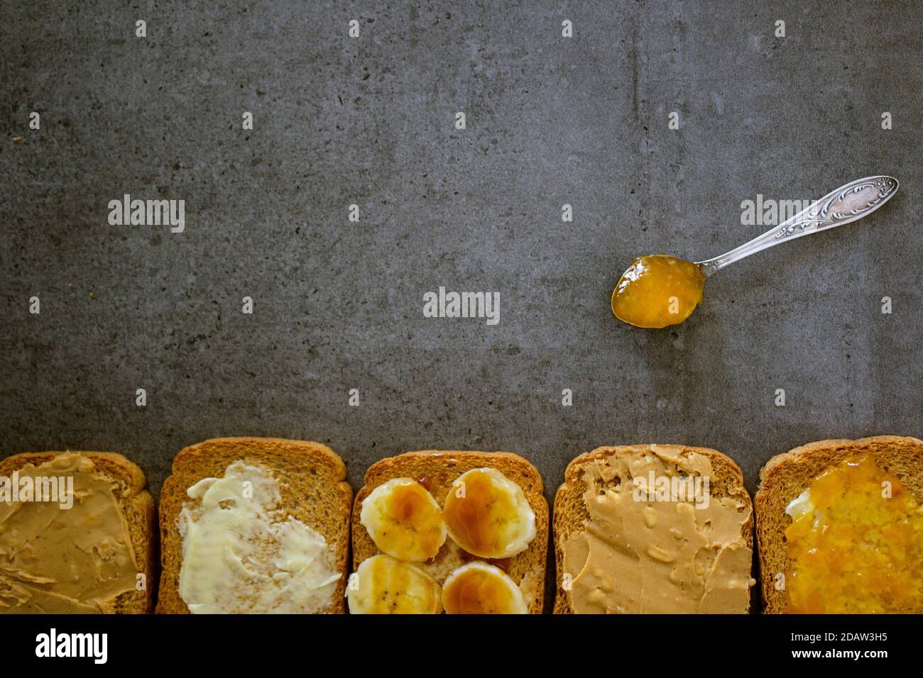 Frame or border made of toast bread with different toppings. Sweet ...