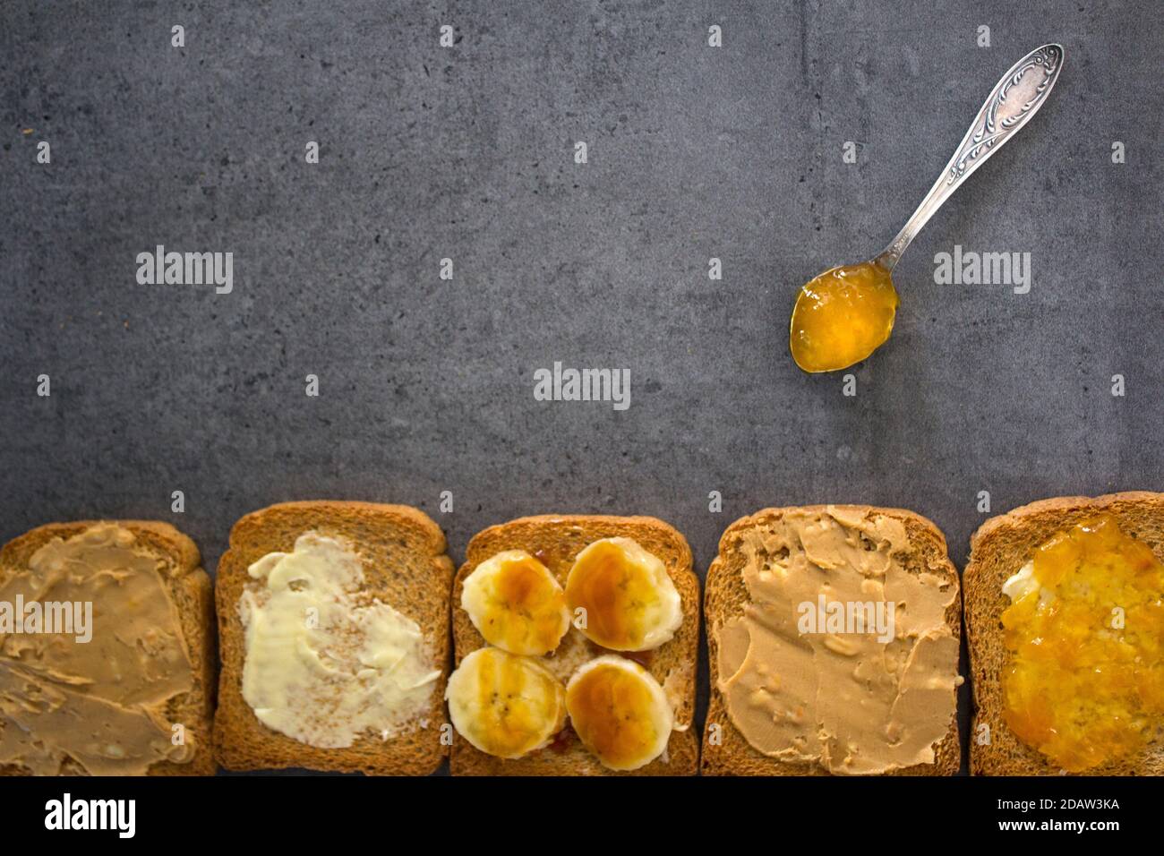 Frame or border made of toast bread with different toppings. Sweet ...