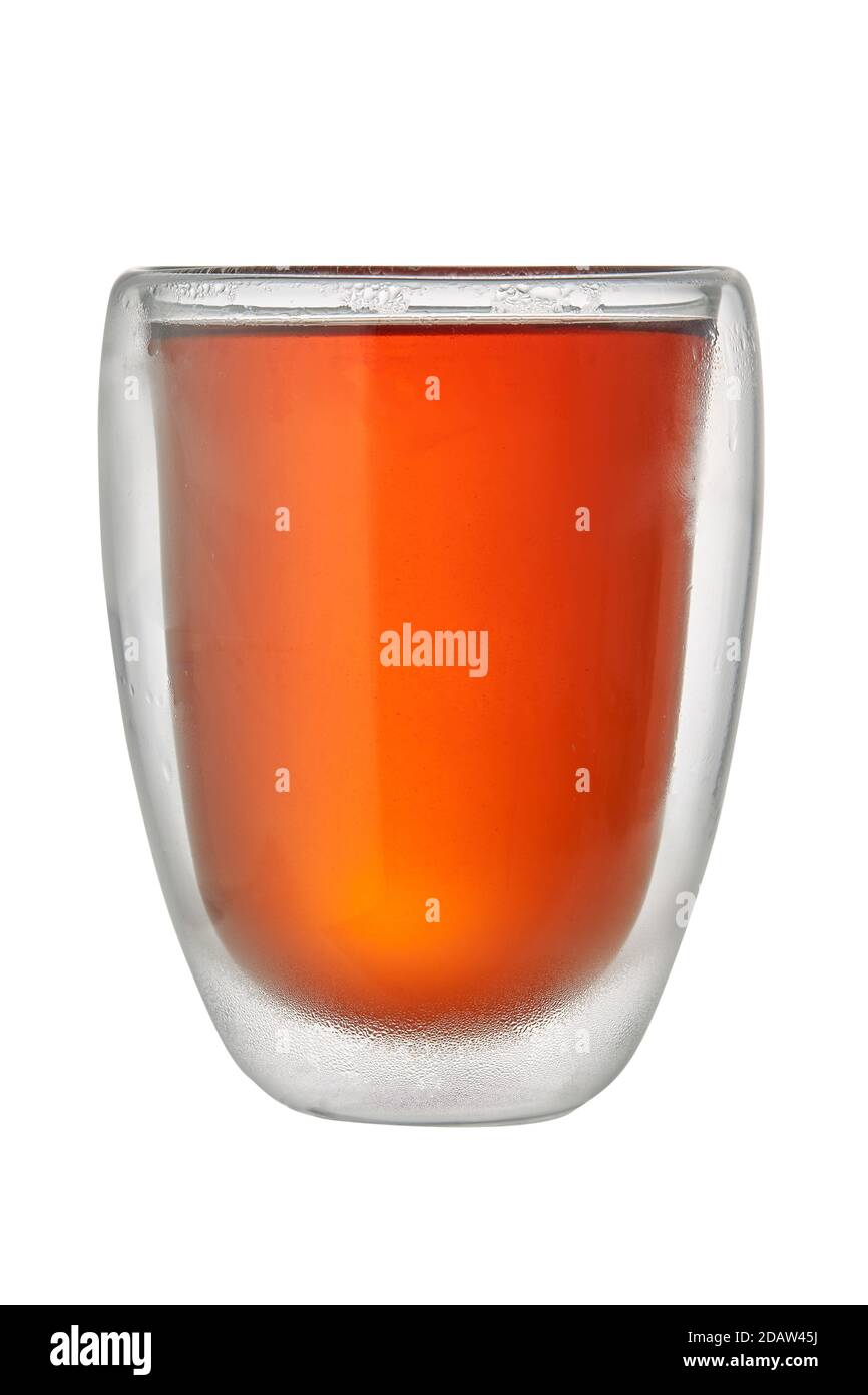 Double sided wall glass. Cup of tea isolated on white background. Close ...