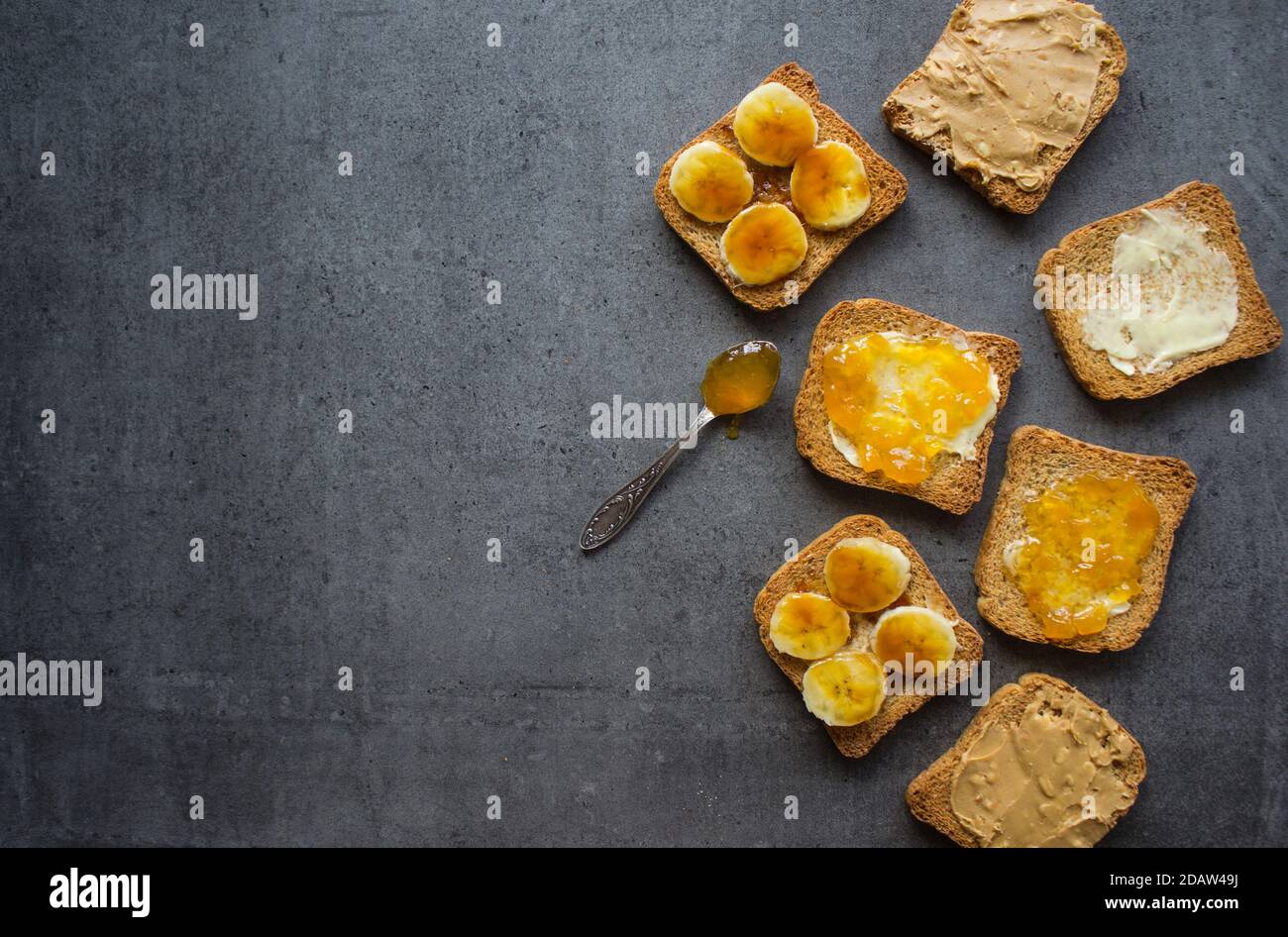 Frame or border made of toast bread with different toppings. Sweet ...