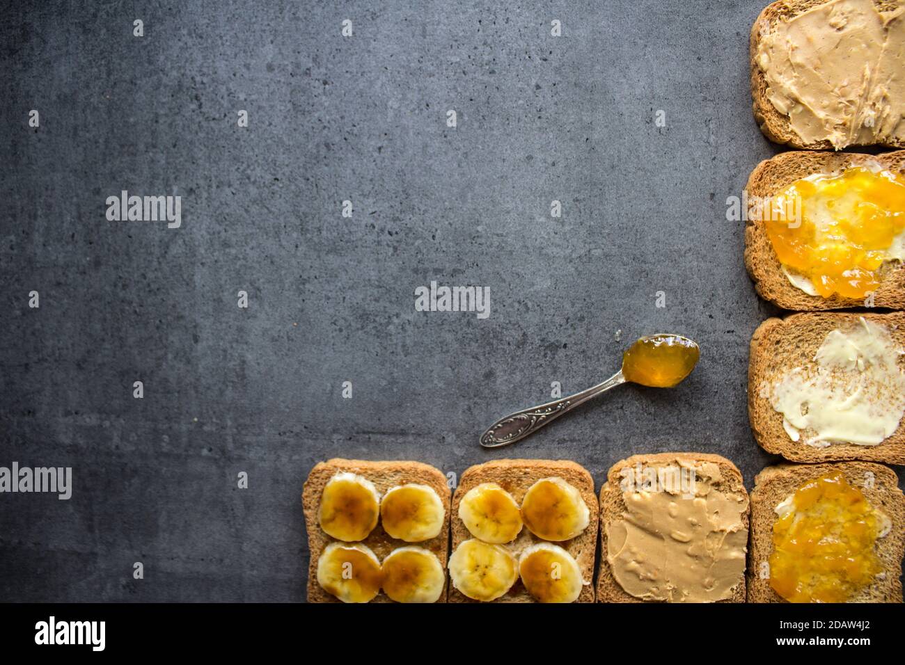 Frame or border made of toast bread with different toppings. Sweet ...