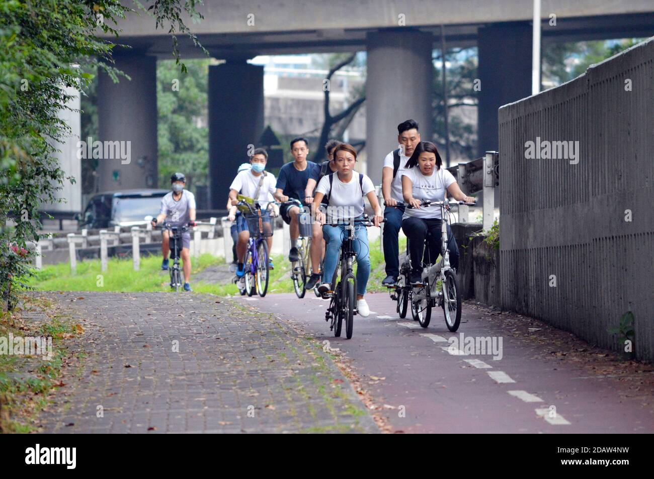 Cyclists on a cycle track in Au Tau, Hong Kong, part of the New ...