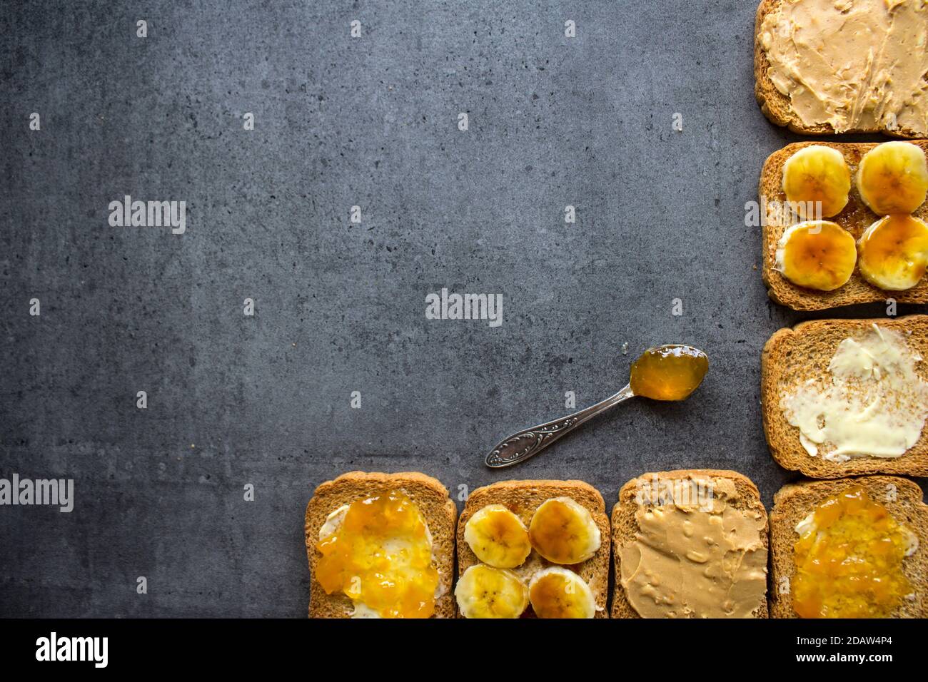 Frame or border made of toast bread with different toppings. Sweet ...