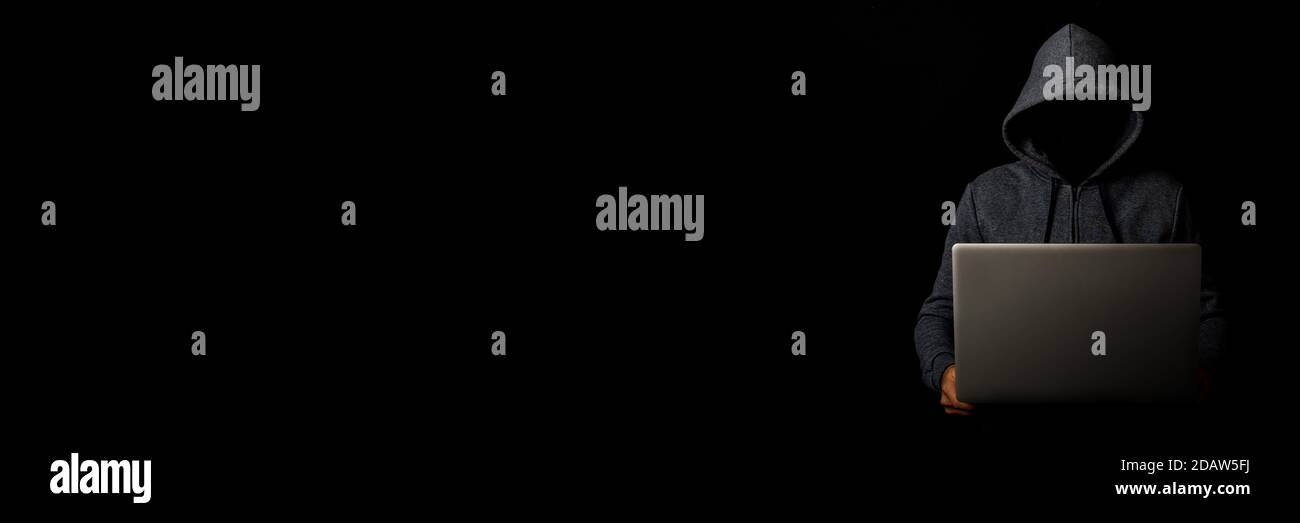 Faceless computer hacker hi-res stock photography and images - Alamy