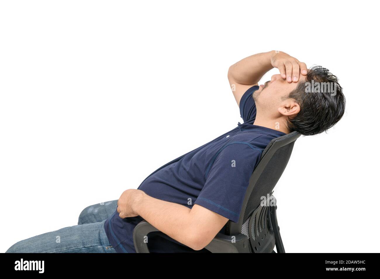 Middle-aged man sitting on chair and feeling stressed and headache ...