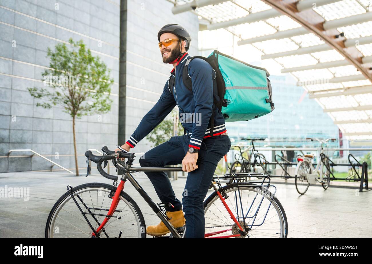 Food delivery service, rider delivering food to clints with bicycle ...
