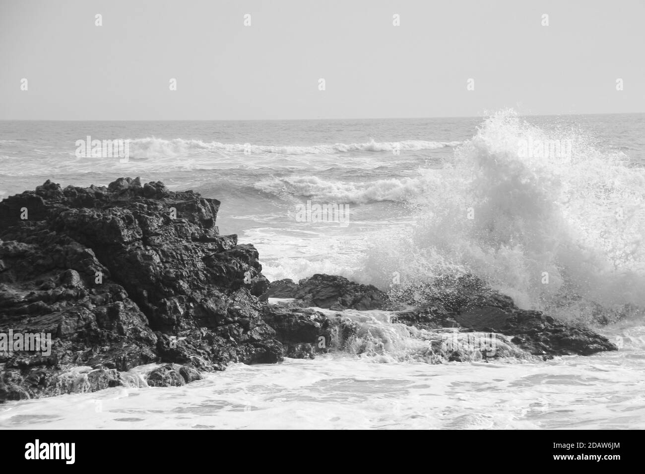 On the shore of the wild atlantic ocean in Yzerfontein, Rocks and surf ...