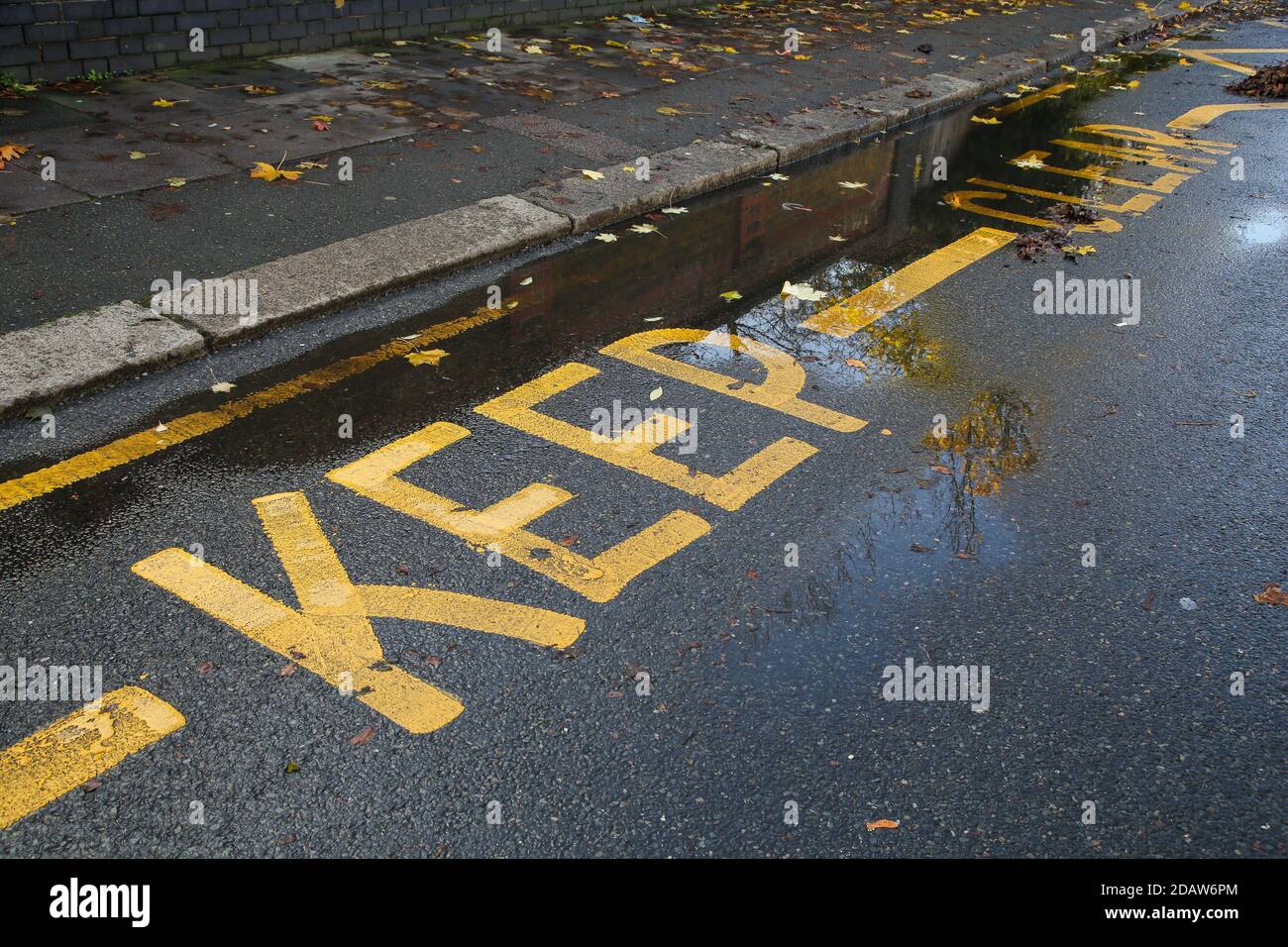 A 'Keep Clear' road marking seen on a road in London Stock Photo - Alamy