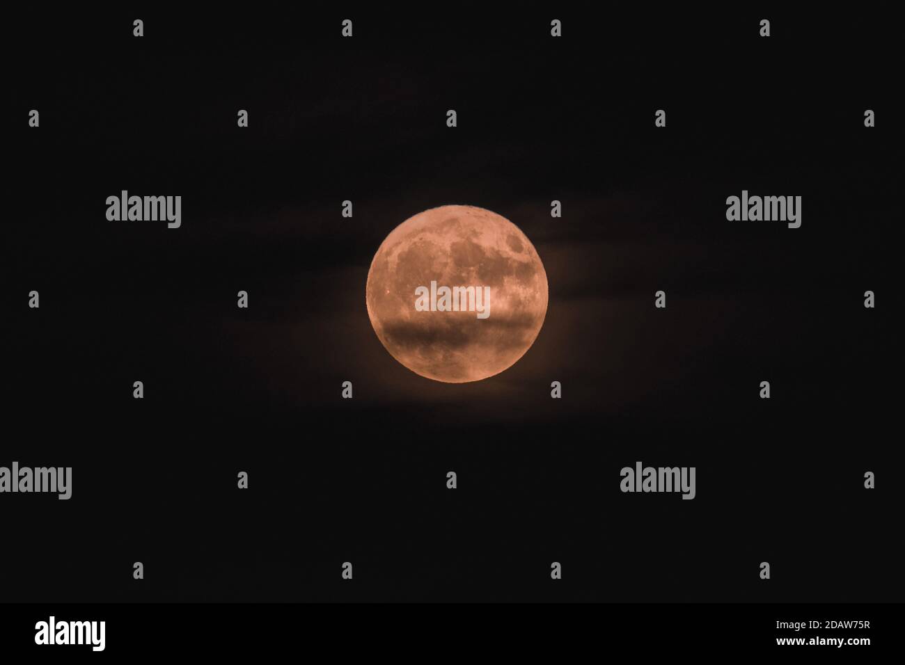 Bright full moon captured in the dark sky at night Stock Photo - Alamy