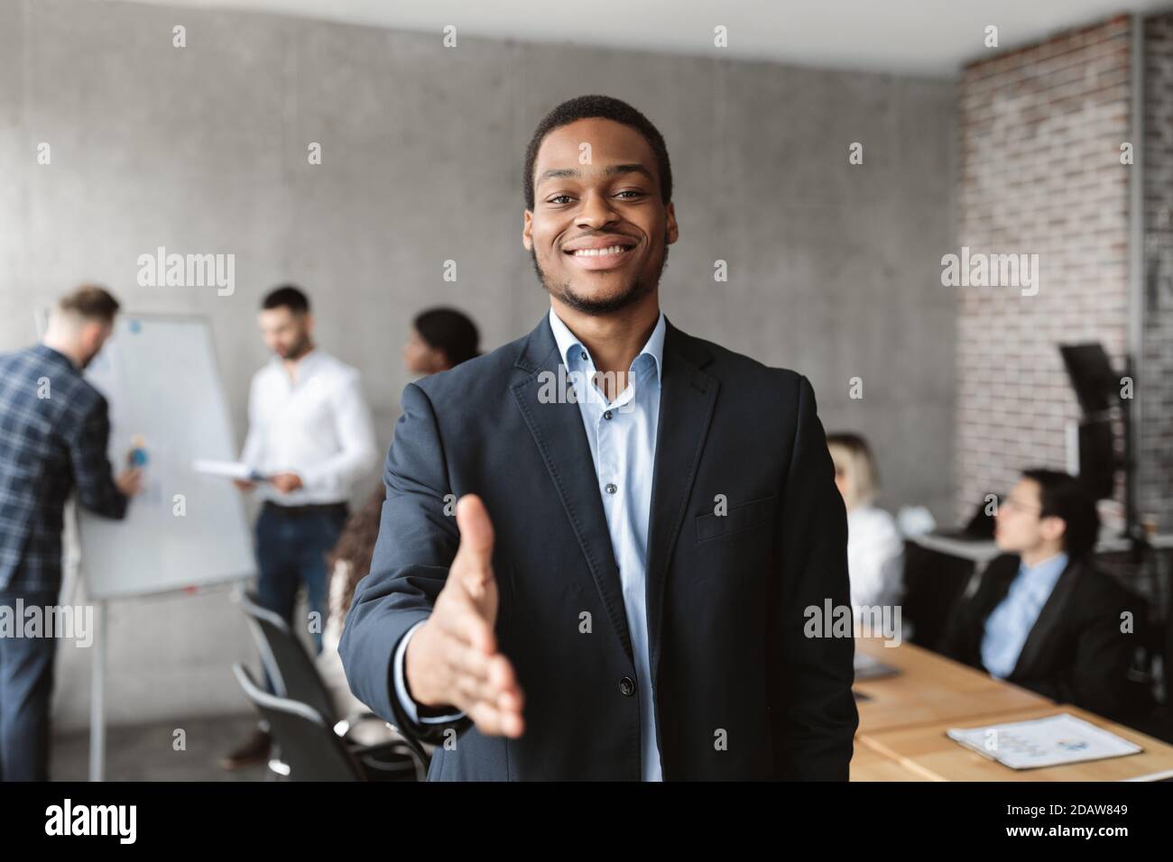 Black Businessman HR Stretching Hand For Handshake In Modern Office ...