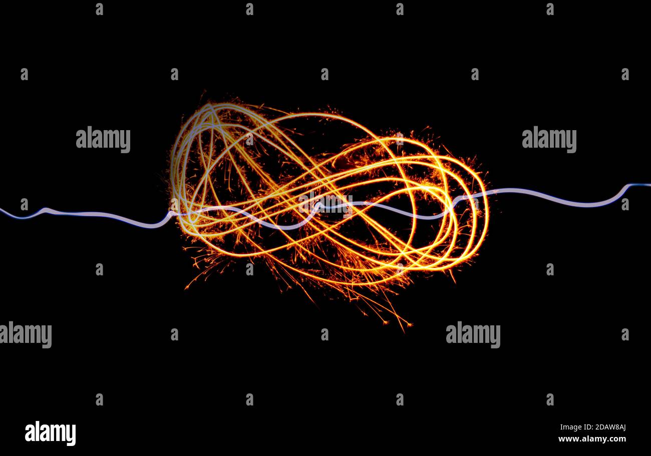 A blended light art image using sparklers and torchlight Stock Photo ...
