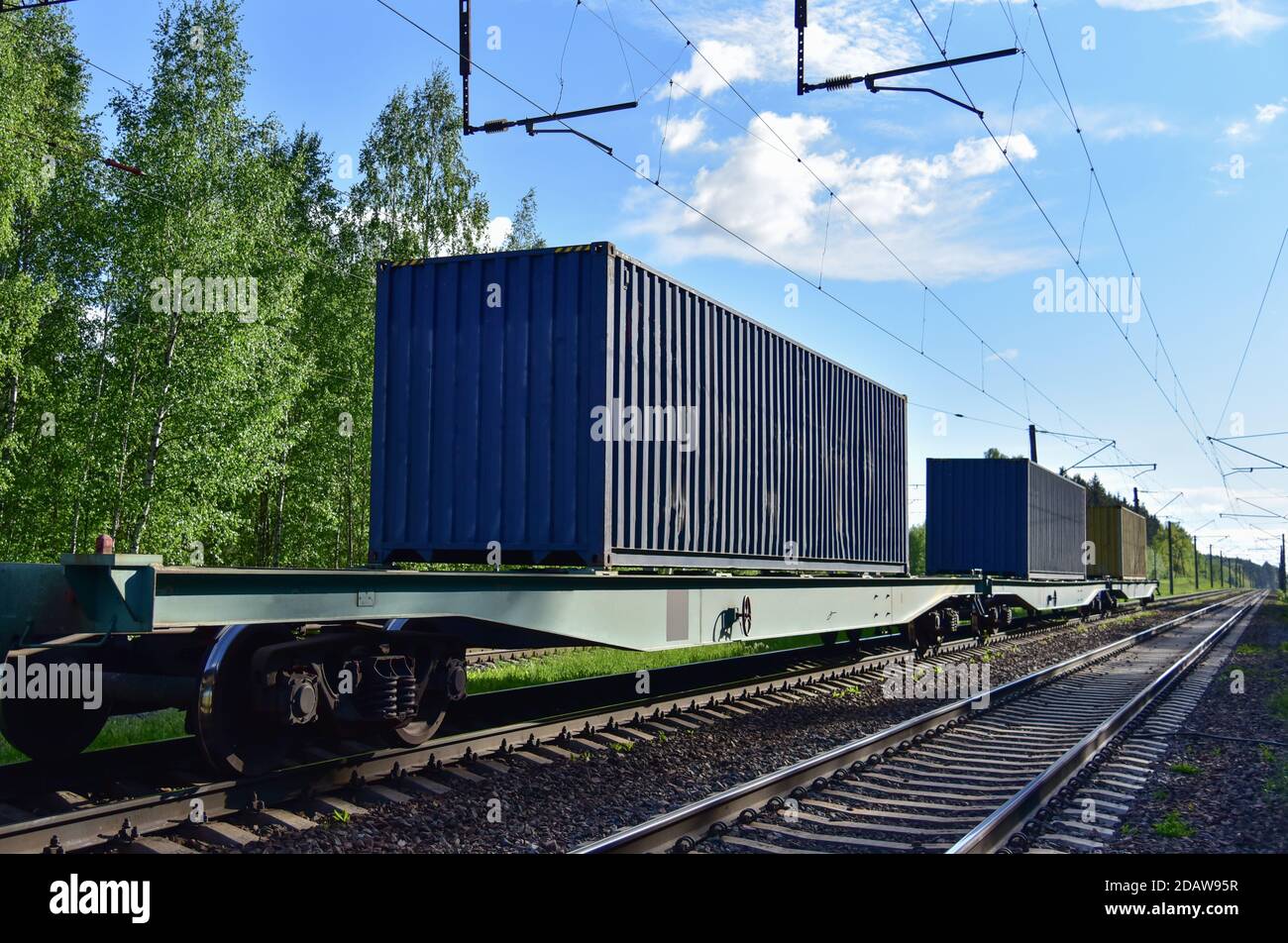 Cargo Containers Transportation On Freight Train By Railway. Intermodal ...