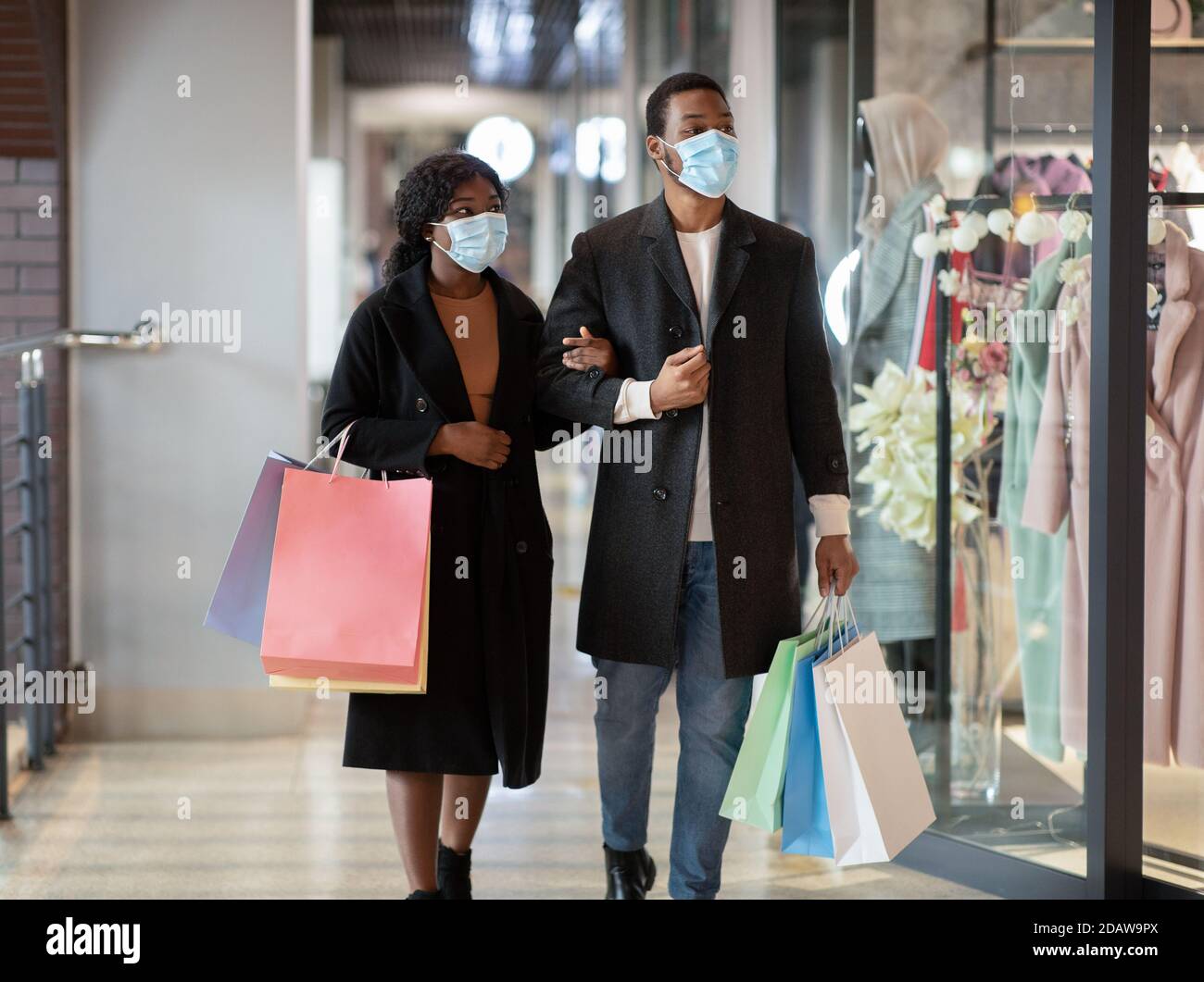 African man walking past hi-res stock photography and images - Alamy