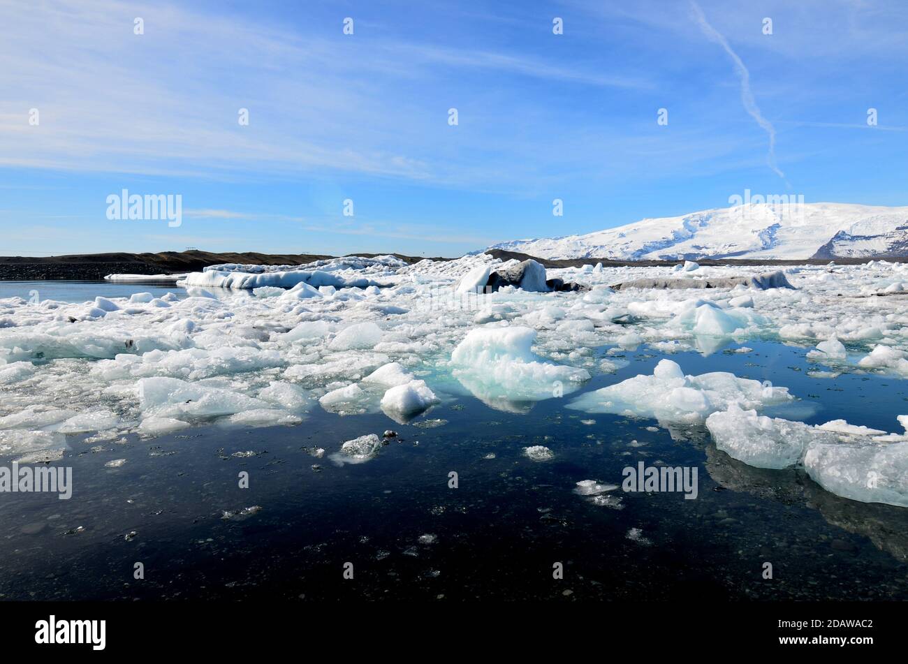 Icelands glacial lagoon with floating chunks of ice Stock Photo - Alamy