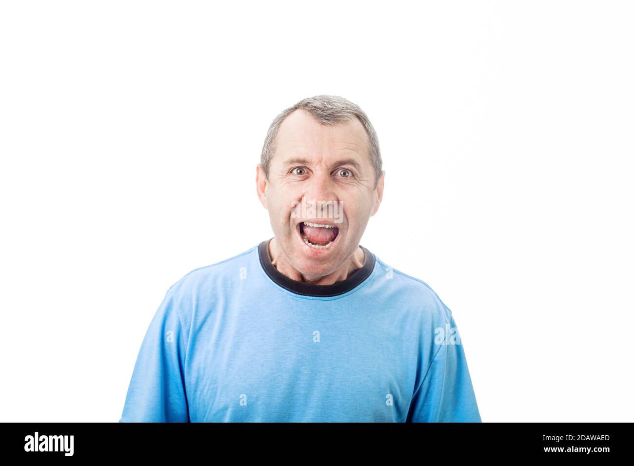 Angry middle aged man screaming yelling isolated over white background ...