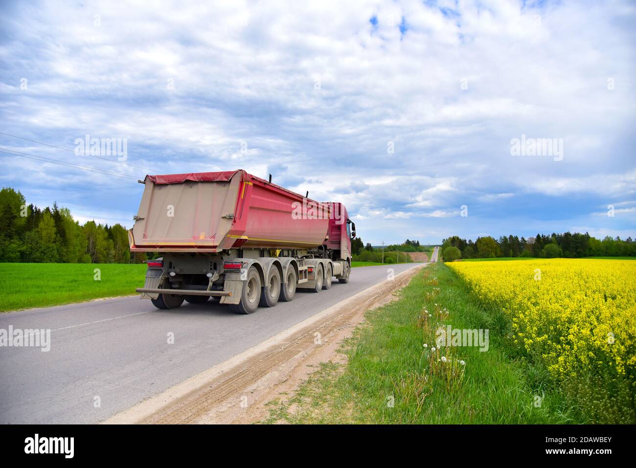 Truck with tipper semi trailer transported sand from the quarry on ...