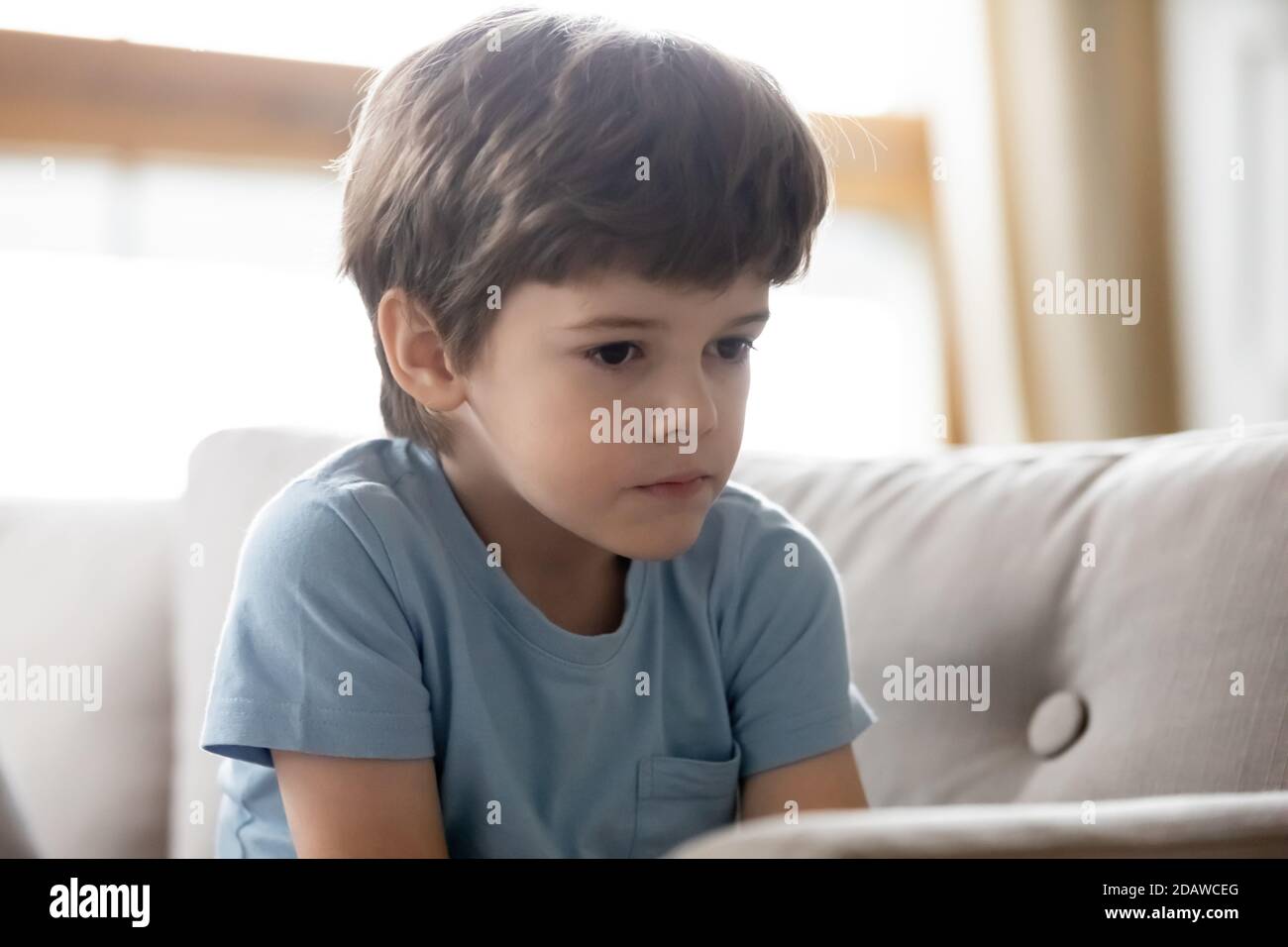Close up unhappy upset little boy pouting, sitting alone Stock Photo ... Close up unhappy upset little boy pouting, sitting alone Stock Photo ...