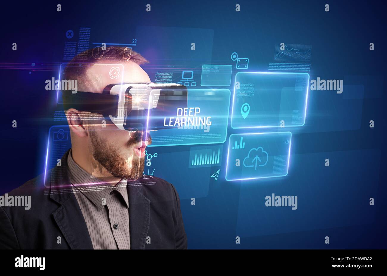 Businessman looking through Virtual Reality glasses with DEEP LEARNING ...