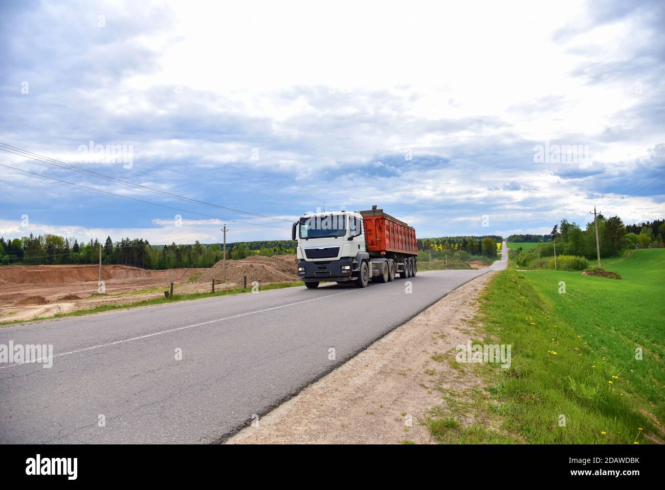 Truck with tipper semi trailer transported sand from the quarry on ...