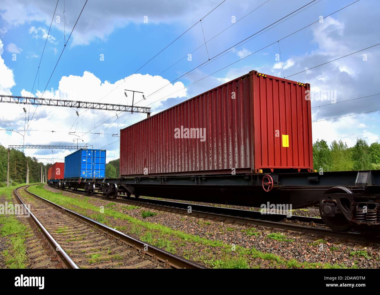 Cargo Containers Transportation On Freight Train By Railway. Intermodal ...