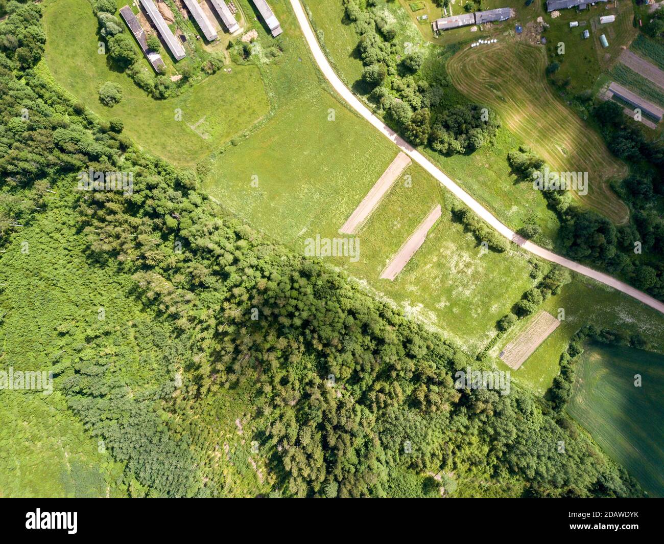 countryside aerial landscape with roads and green fields in summer ...