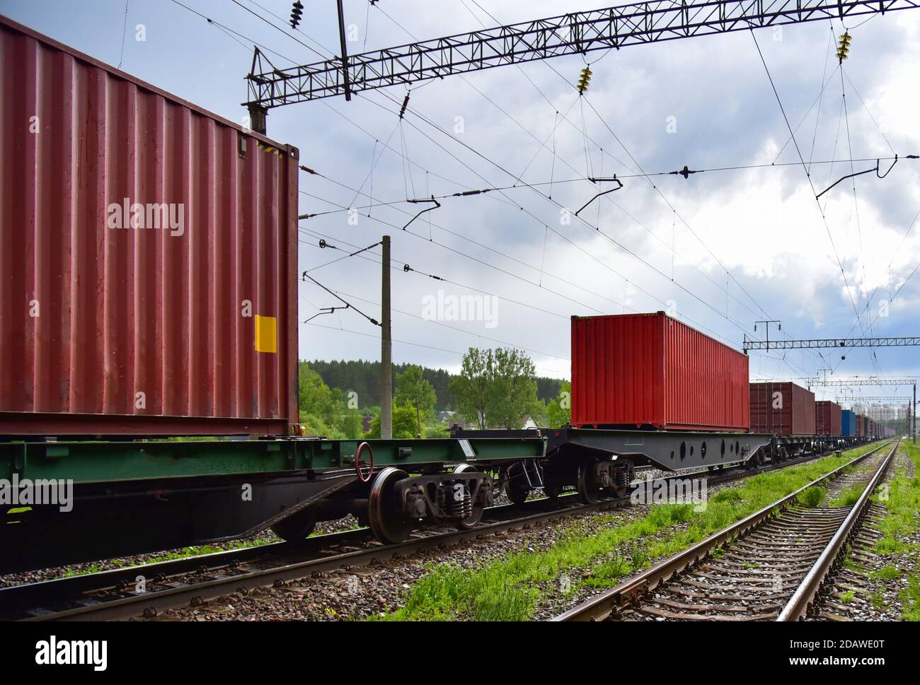 Cargo Containers Transportation On Freight Train By Railway. Intermodal ...