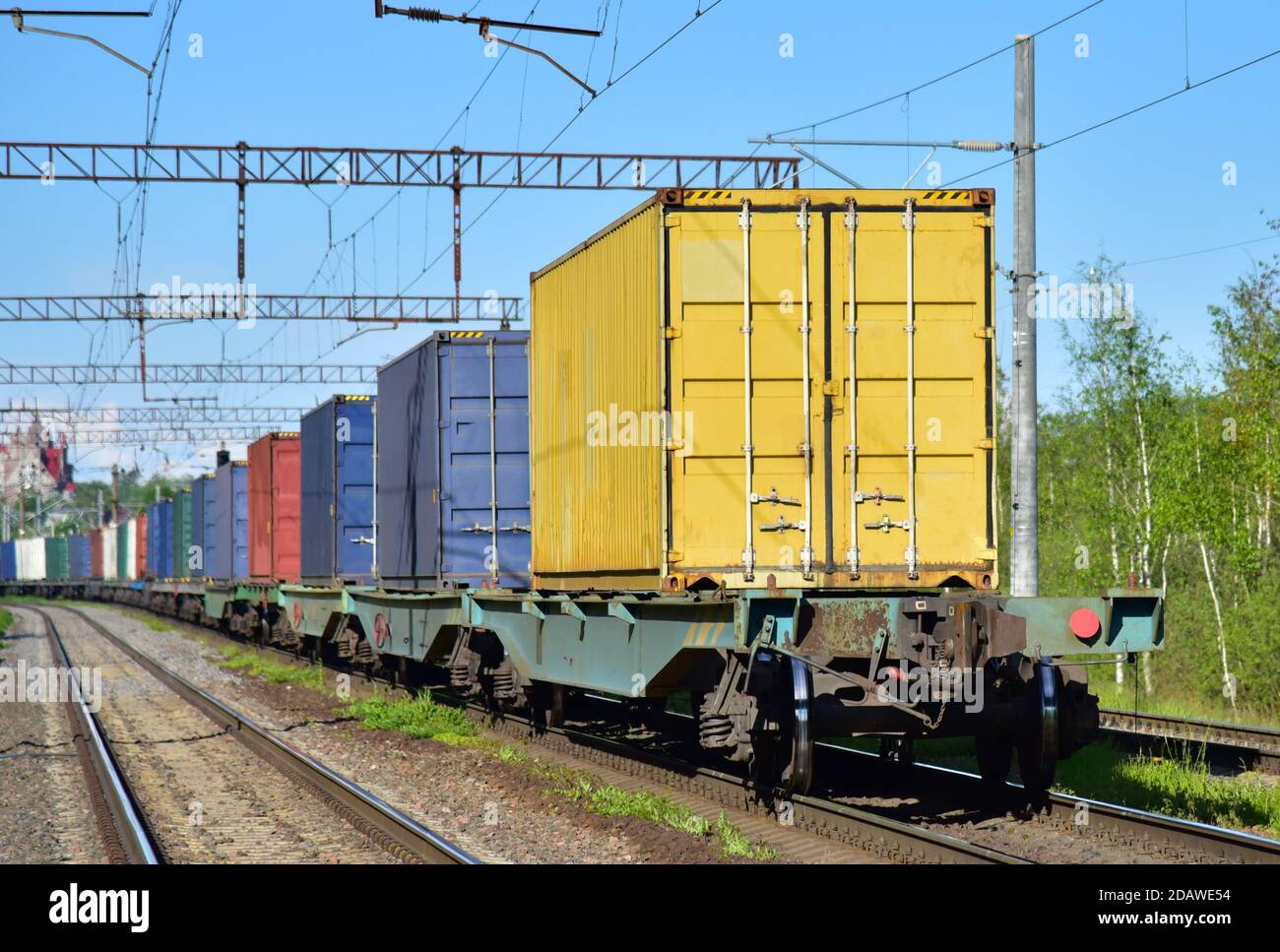 Cargo Containers Transportation On Freight Train By Railway. Intermodal ...