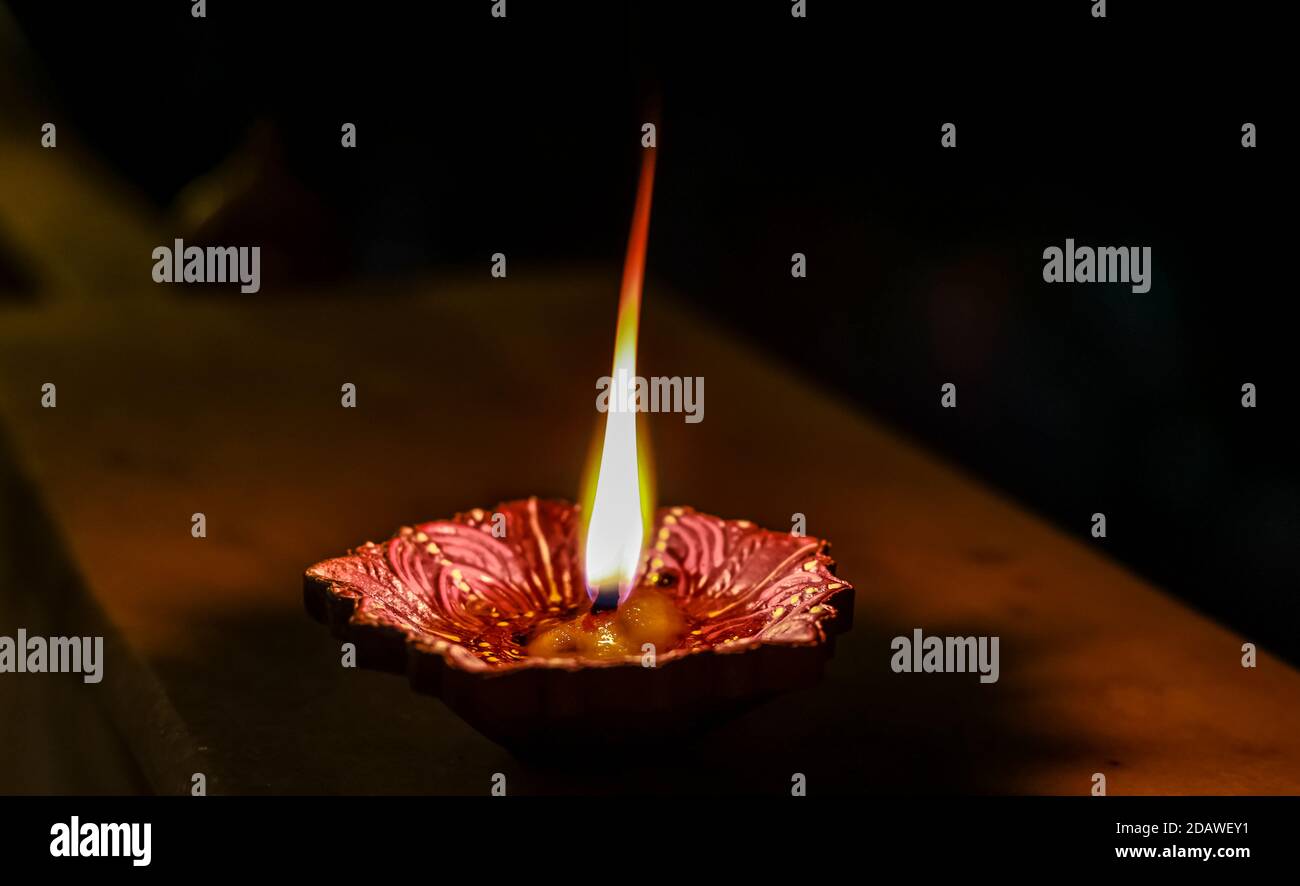 Diwali Celebration - Colorful and sparkling clay diya lamps ready for ...