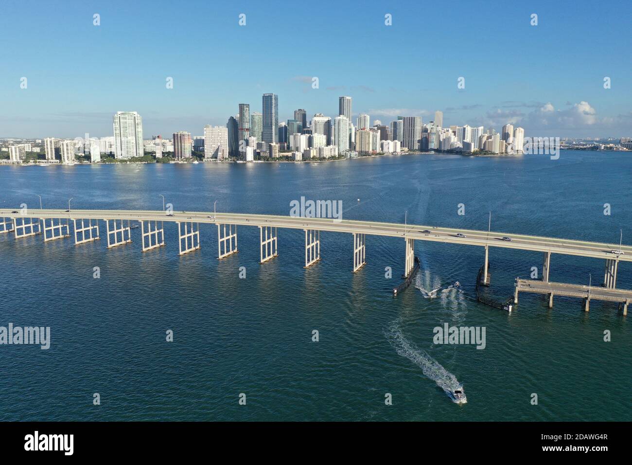 Aerial view of City of Miami skyline with Rickenbacker Causeway bridge ...