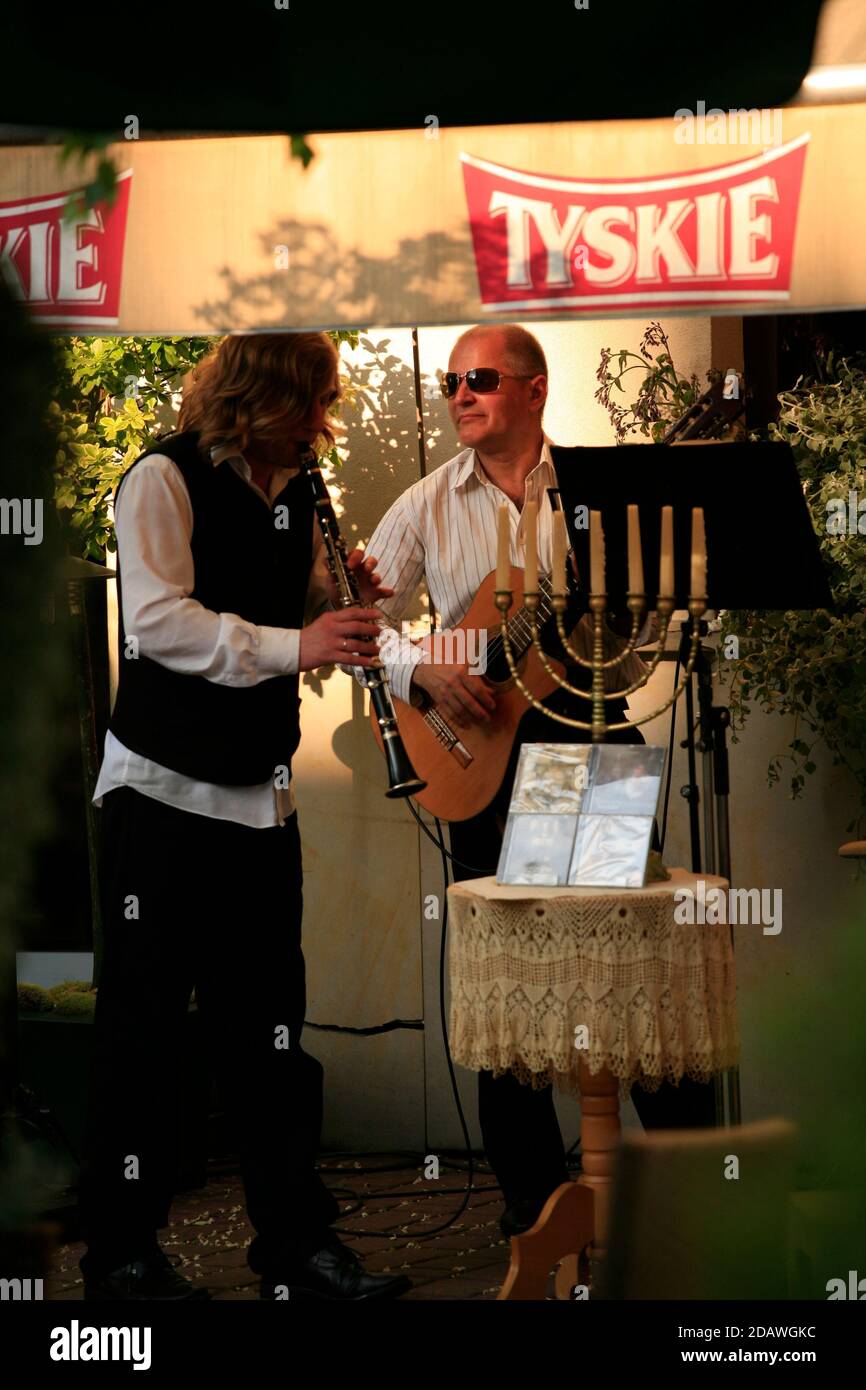 Traditional Klezmer music is played in Kazimierz’s small restaurants ...